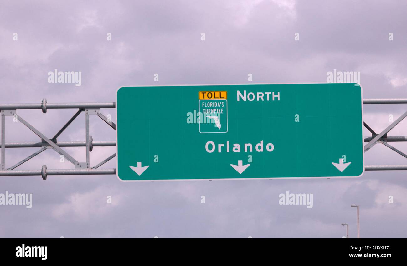 Street sign on the highway of Florida showing Orlando Stock Photo - Alamy