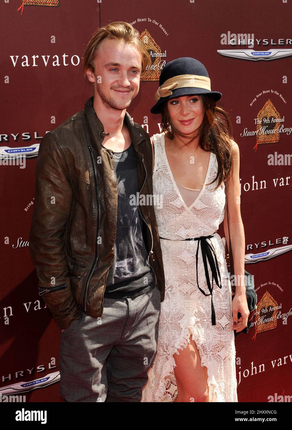 Tom Felton and his girlfriend attending the John Varvatos 9th Annual ...