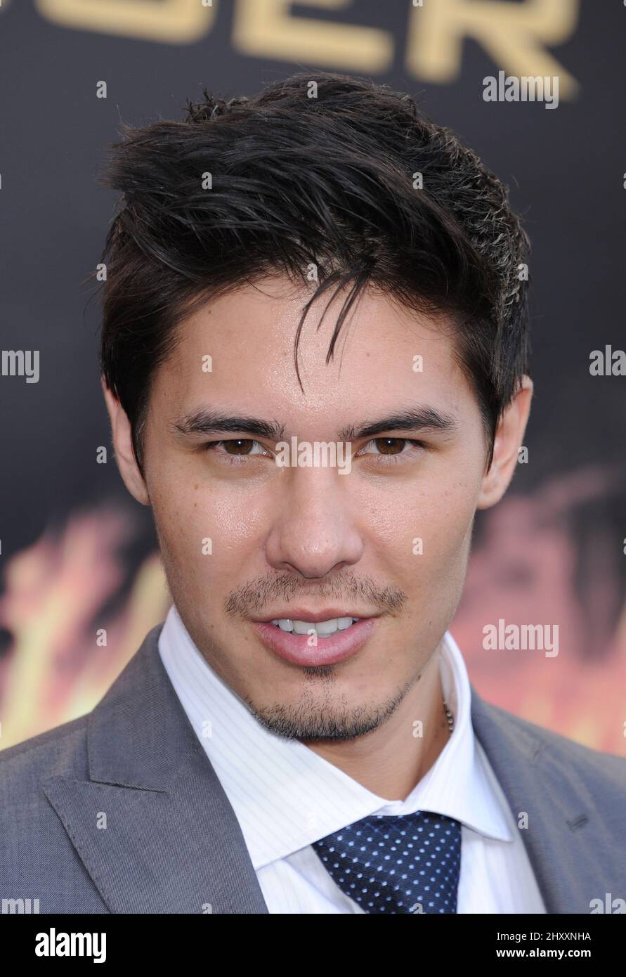 Lewis Tan attending "The Hunger Games" world premiere held at the Nokia ...