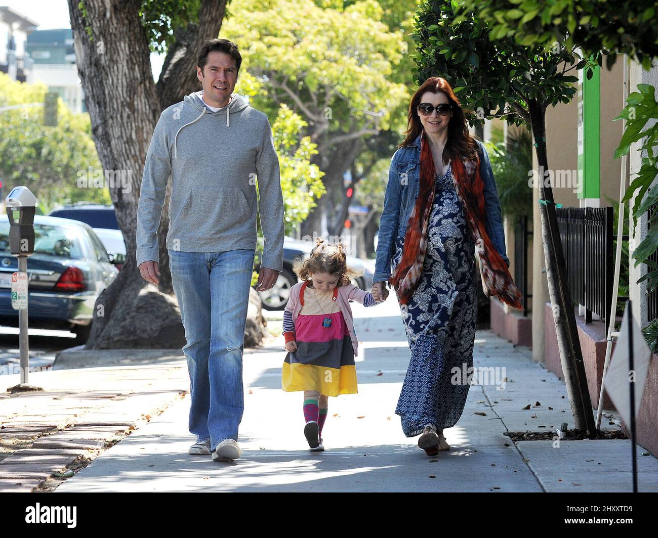 Alyson Hannigan and Alexis Denisof with their daughter Satyana out and ...