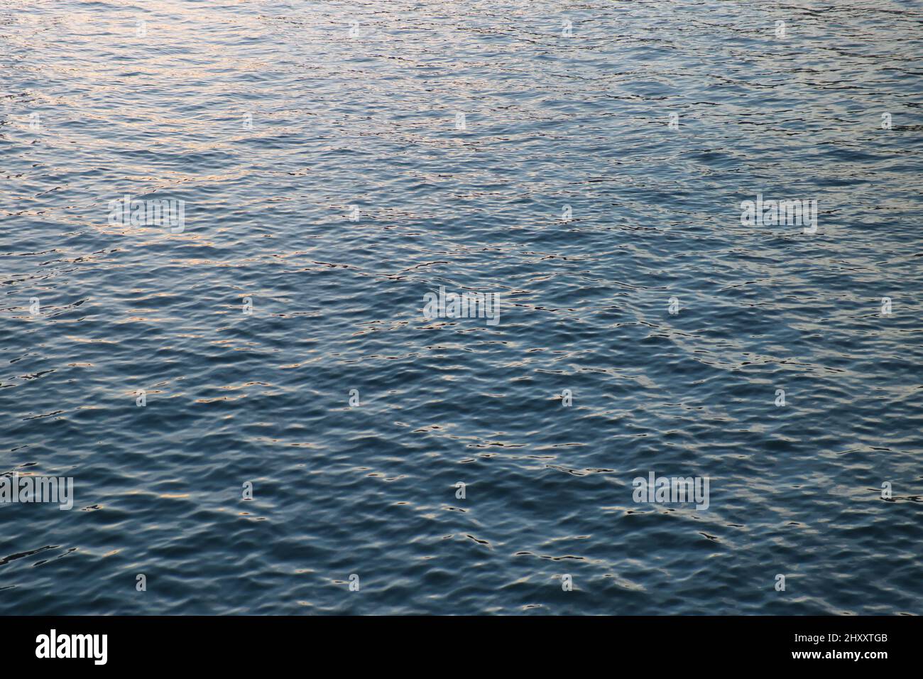 Calm ripple on water surface. River, lake, pond, sea pure blue water ...