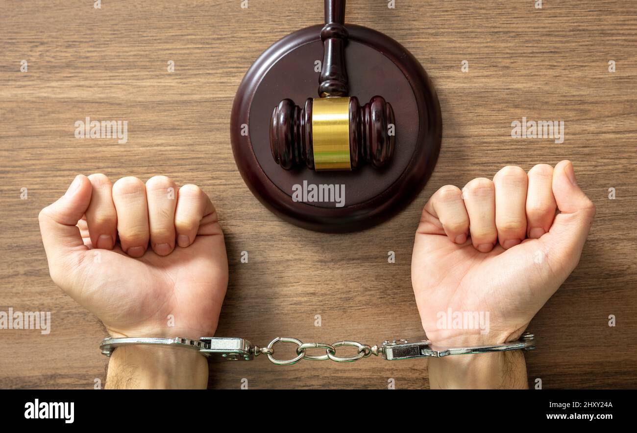 Jail prison handcuff hi-res stock photography and images - Alamy