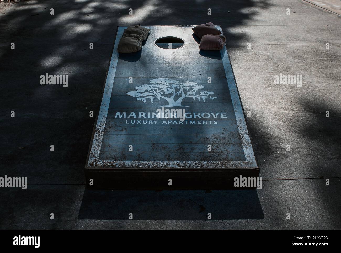 Closeup of a cornhole game board outside Stock Photo - Alamy