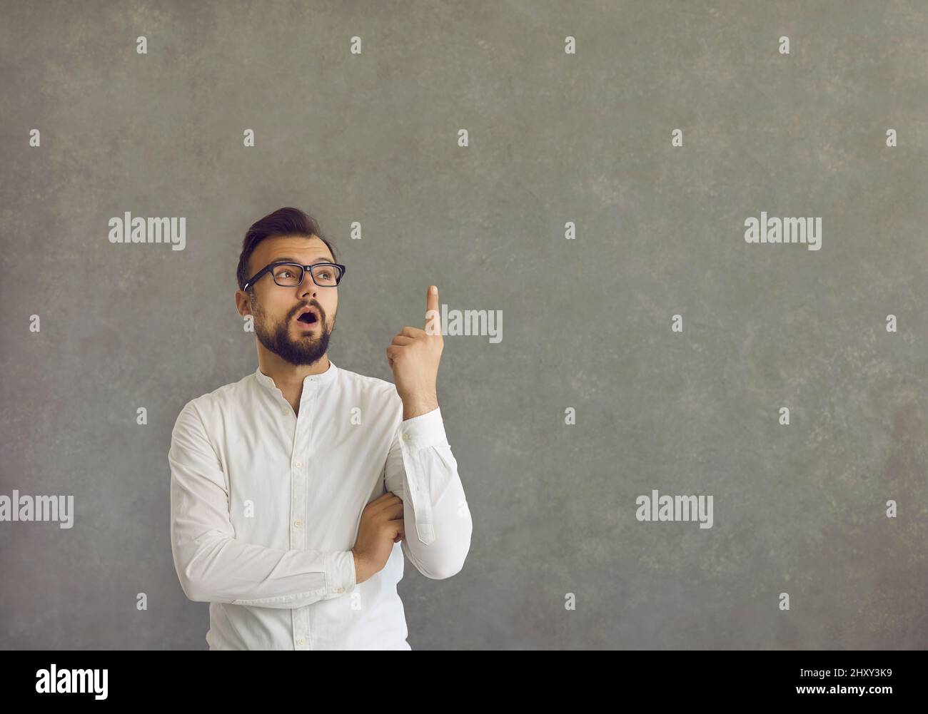 Smart confident Caucasian man who has a great innovative idea showing a ...