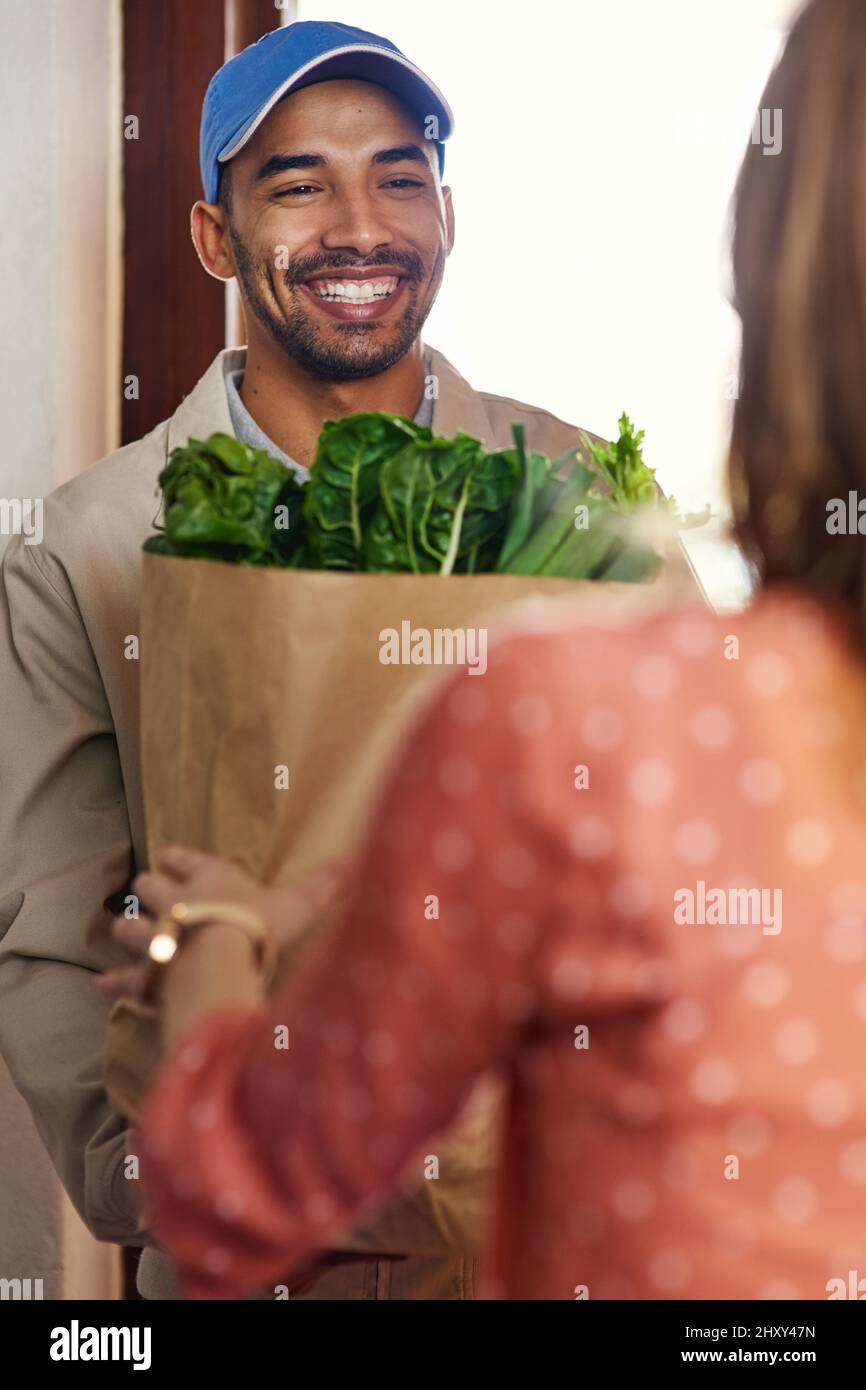 Get groceries delivered to your door. Cropped shot of a handsome young ...