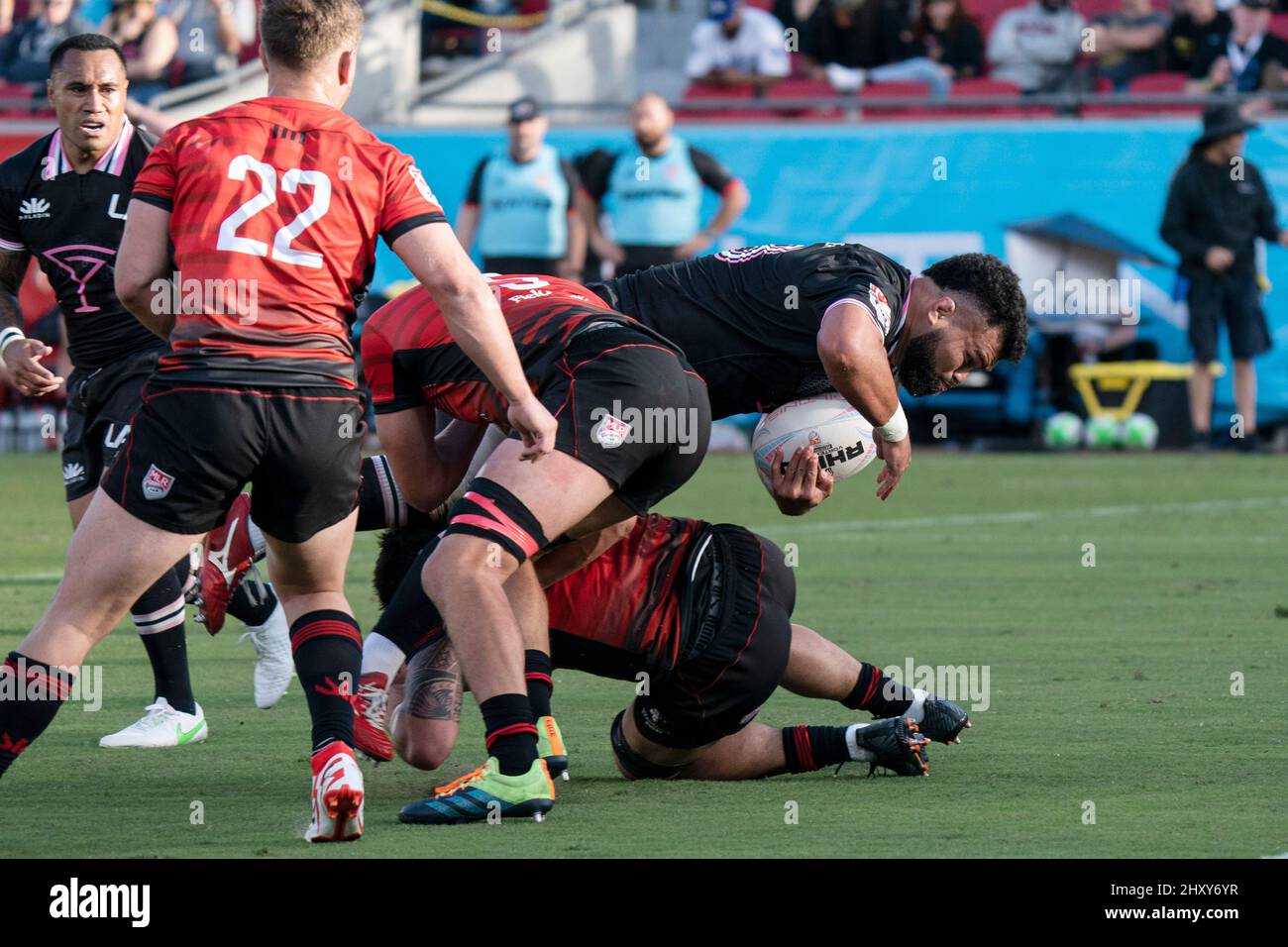 Los Angeles Giltinis tighthead prop Marco Fepulea’i (18) is tackled ...