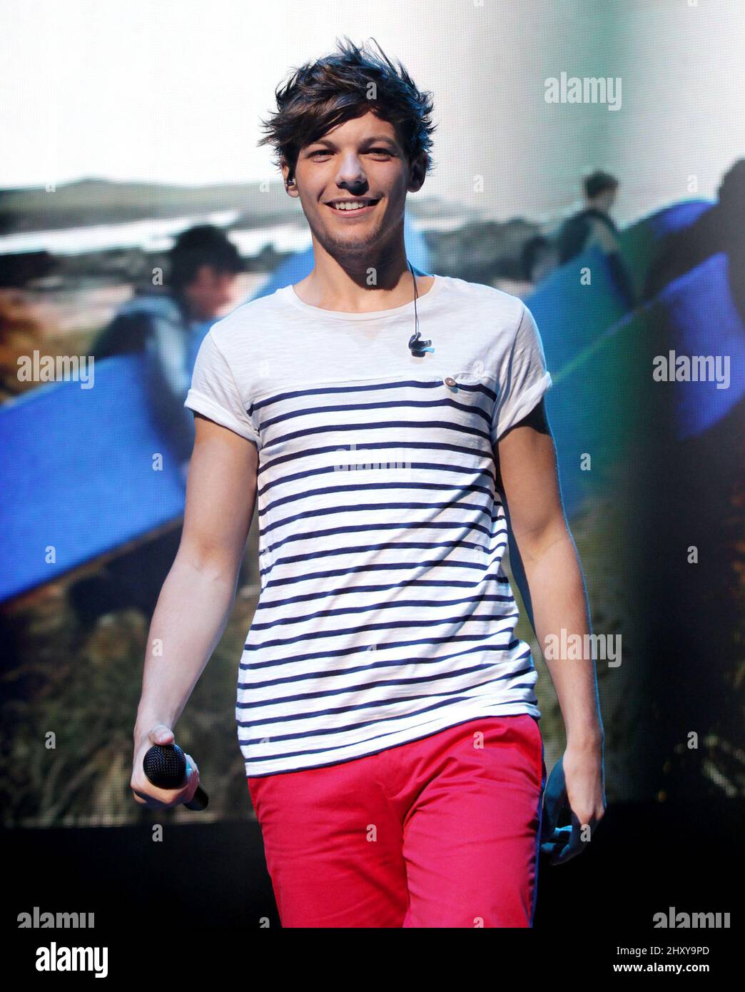 Louis Tomlinson of One Direction performing live in concert at the ...