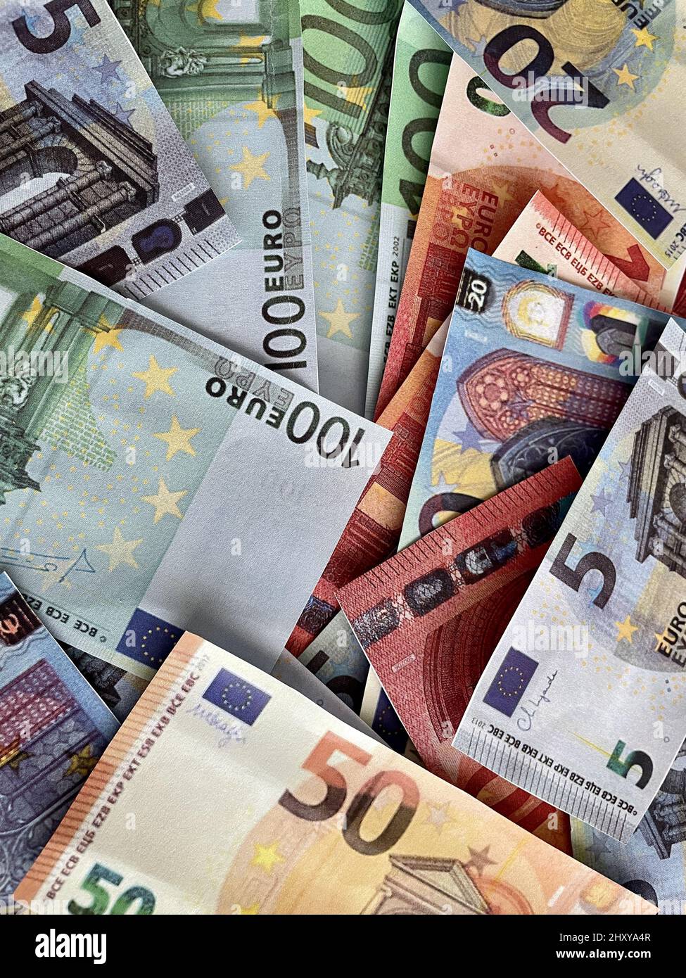 A vertical shot of different euro bills Stock Photo - Alamy