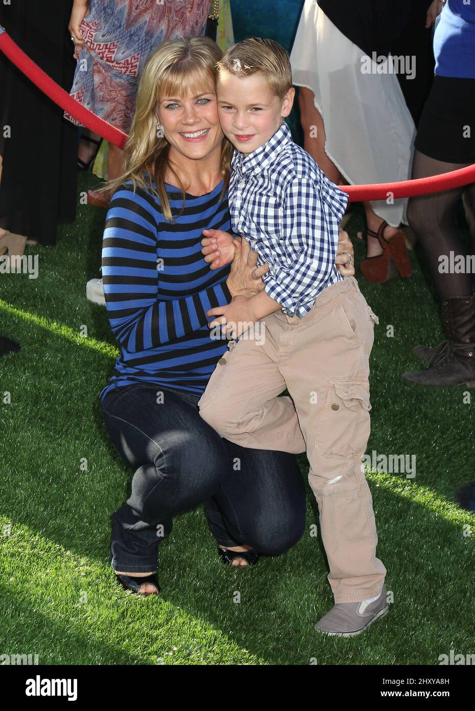 Alison Sweeney and son Ben Sanov attending the "Brave" premiere during ...
