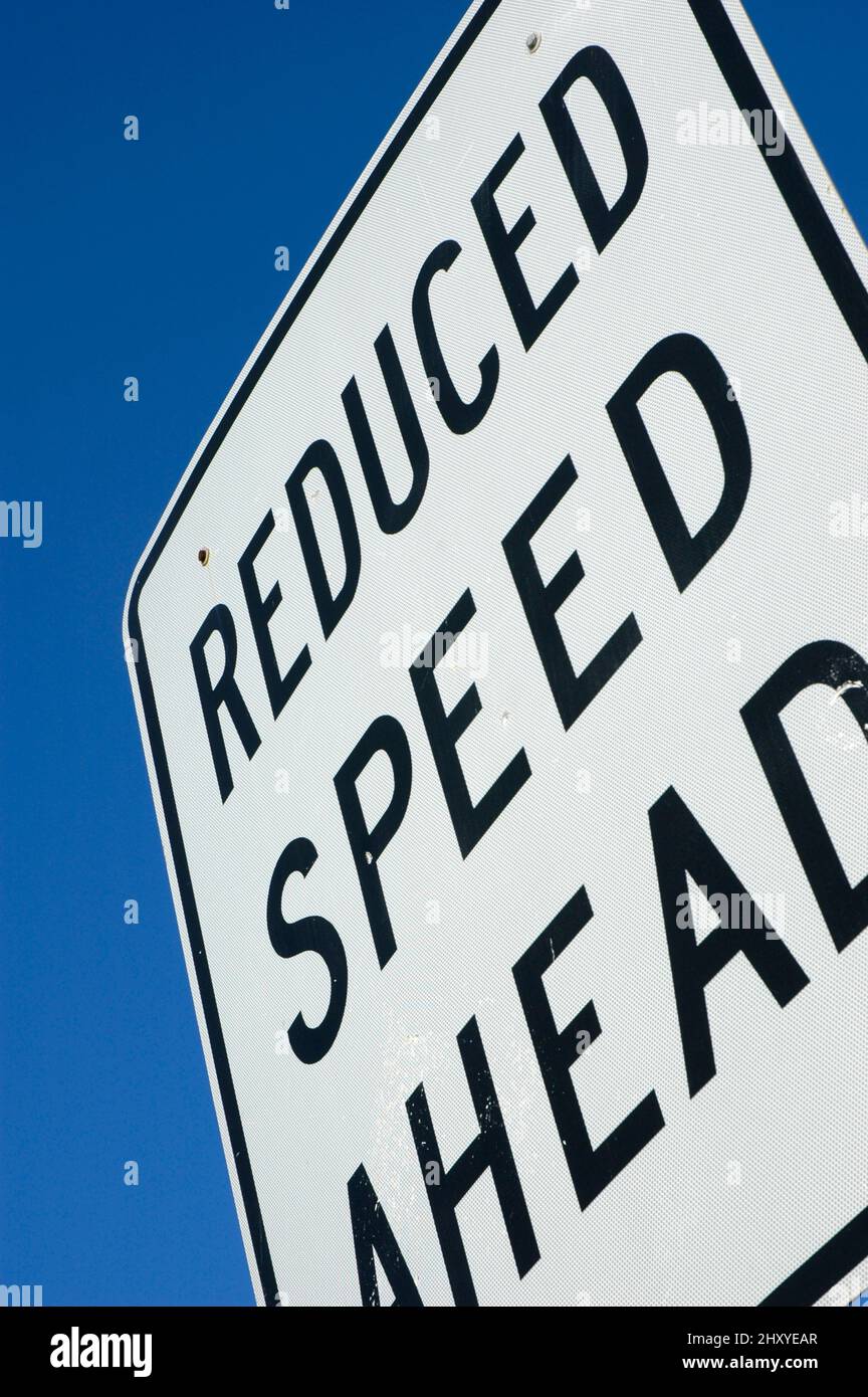 Freeway and road signs on the shoulder of the roadway bed Stock Photo ...