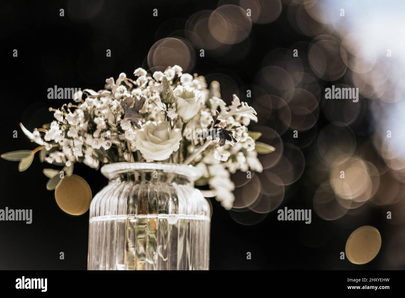 Closeup of flowers in a jar Stock Photo - Alamy