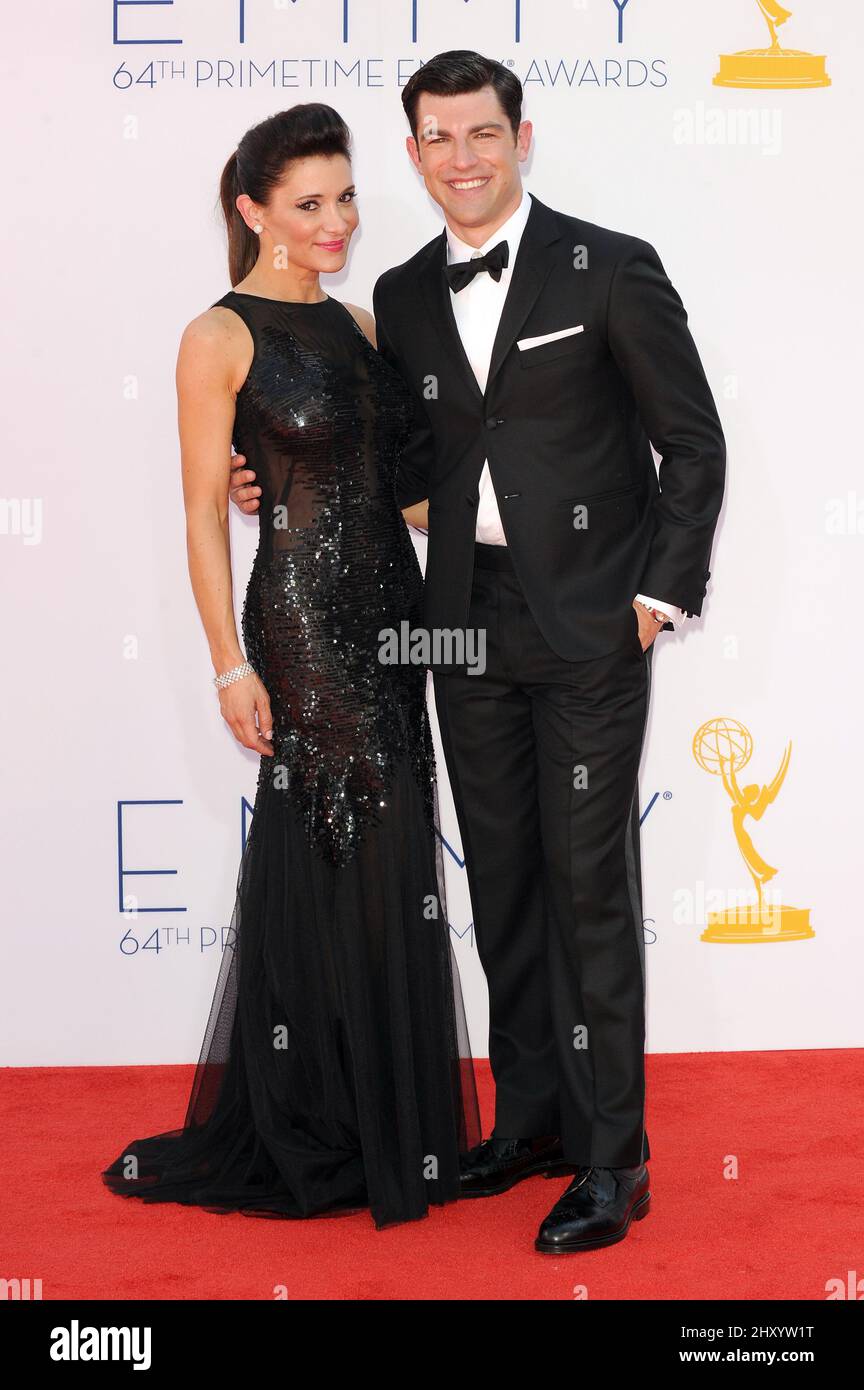 Tess Sanchez, Max Greenfield attends the 64th Primetime Emmy Awards ...