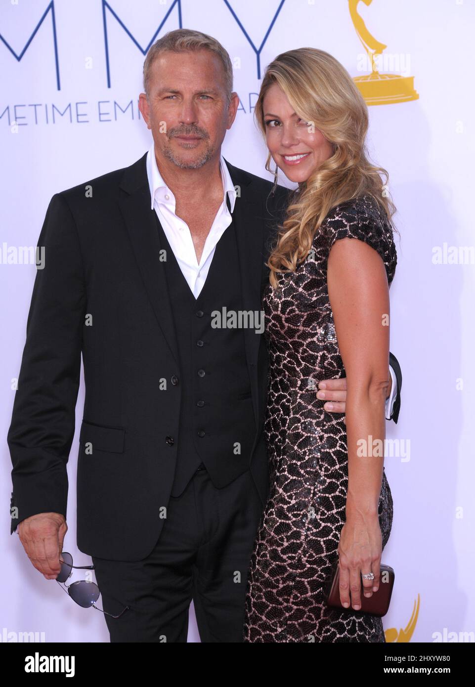 Kevin Costner and Christine Baumgartner attends the 64th Primetime Emmy ...