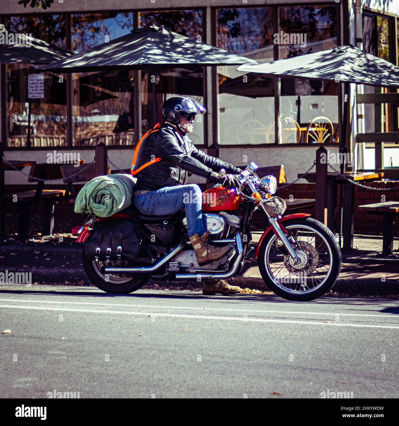 Shot of a man riding a motorcycle in Hahndorf Stock Photo - Alamy