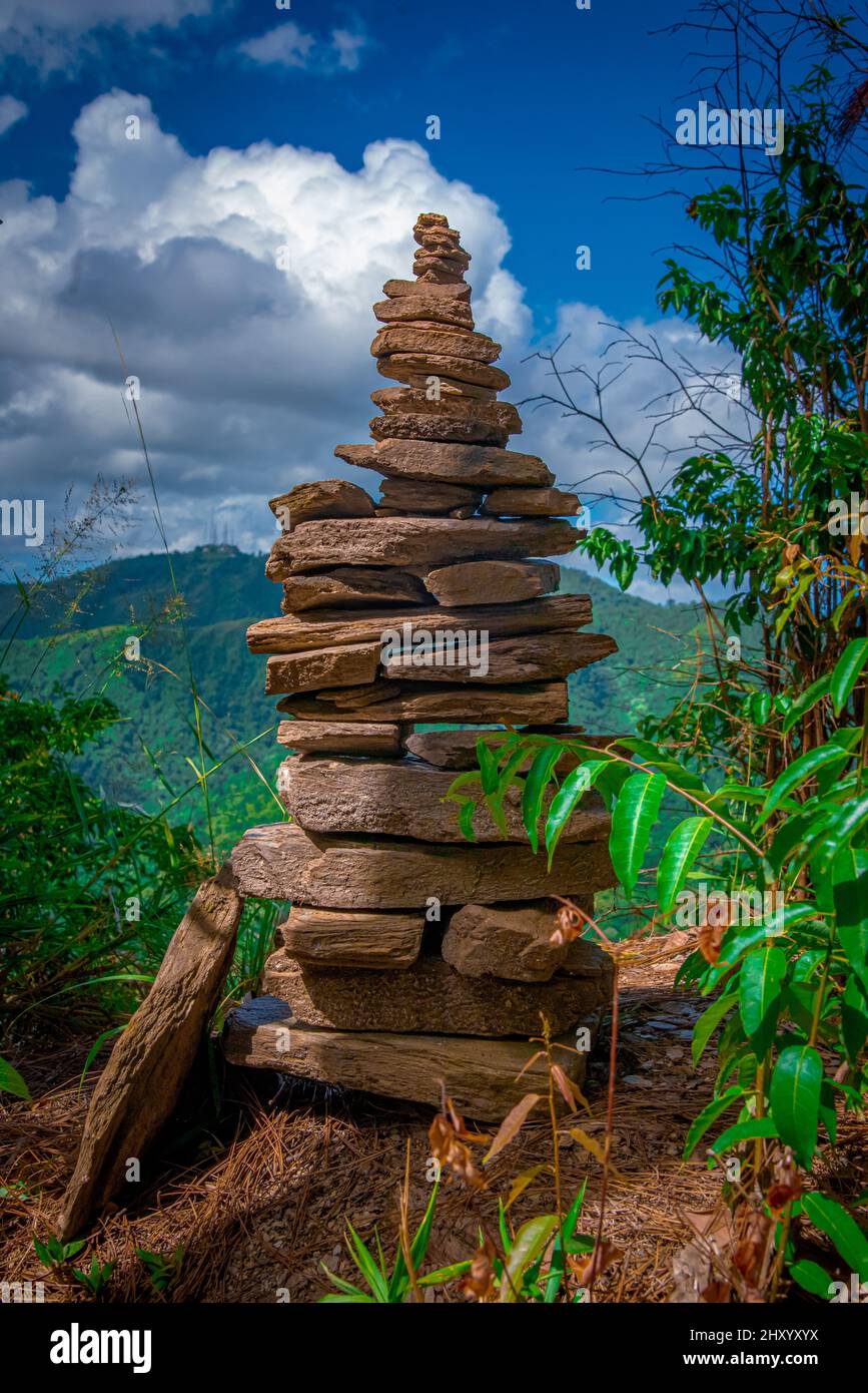 Rocks on top of each other with the beautiful nature of Trinidad and ...