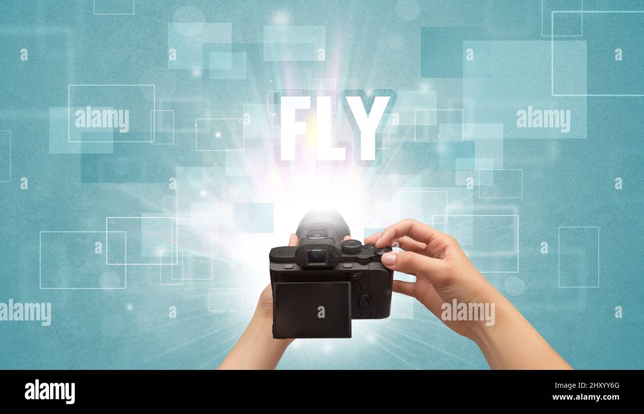 hand holding digital camera, traveling concept Stock Photo - Alamy