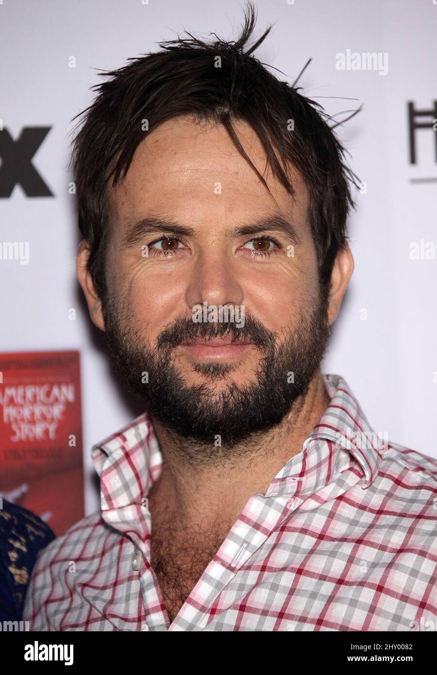 Jason Gann attending the premiere of "American Horror Story: Asylum" at ...