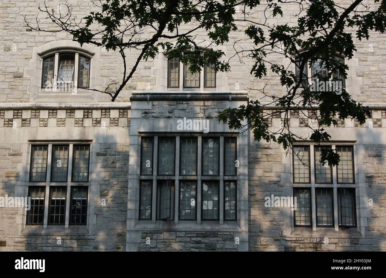 Facade of an old building with windows Stock Photo - Alamy