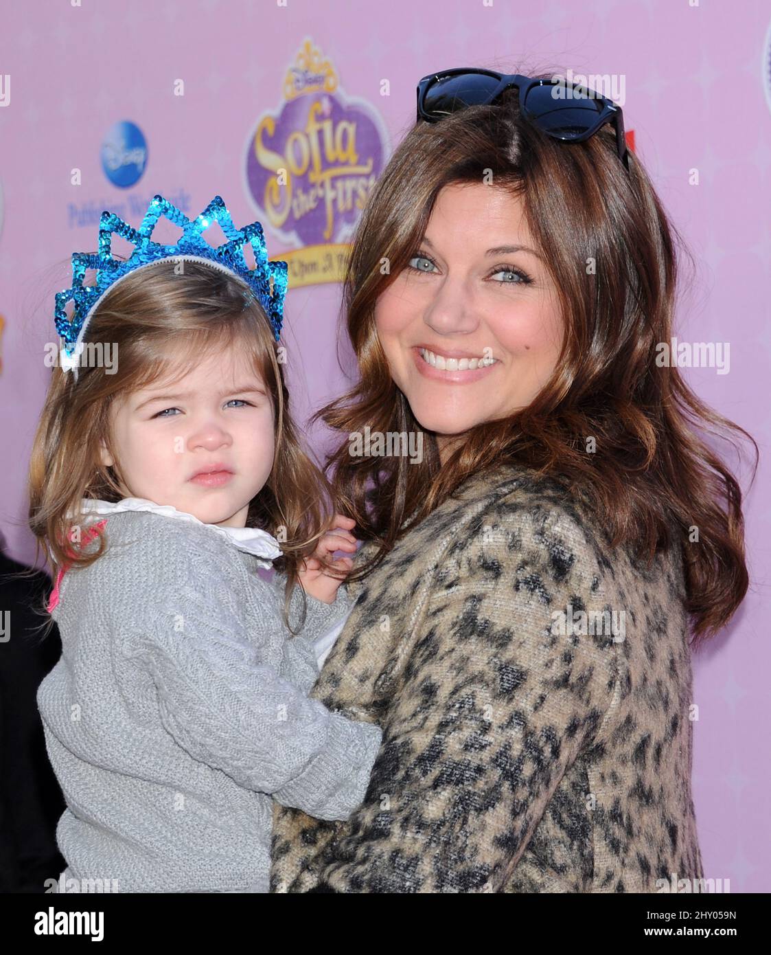 Tiffani Thiessen and Harper Renn Smith attending "Sofia The First: Once ...