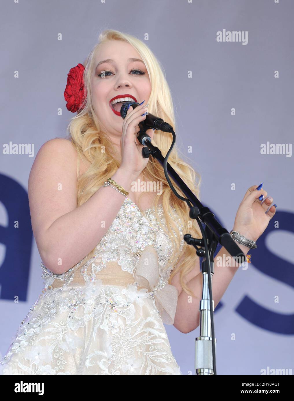Raelynn peforming at the JCP Holiday Giving Tour with Blake Shelton ...