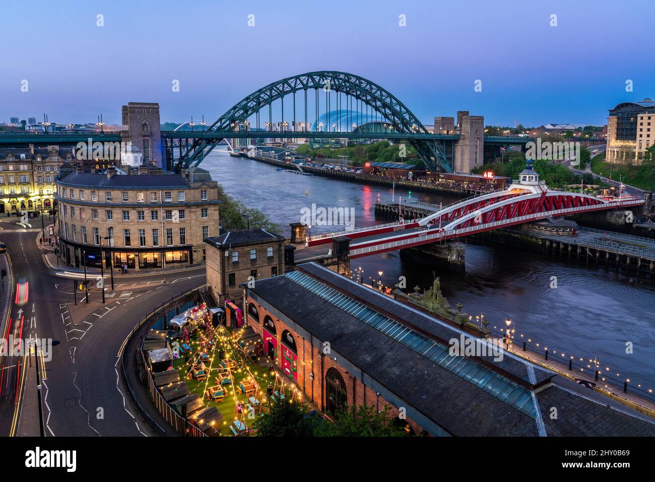 View of the famous Newcastle Swing and Tyne Bridges along the riverside ...