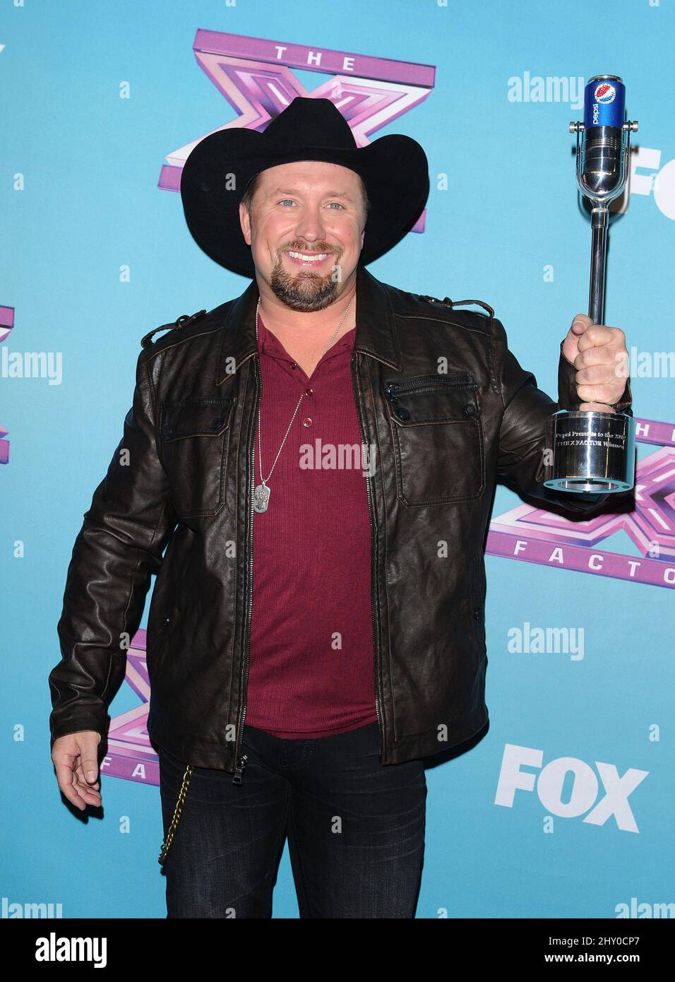 Tate Stevens attends the "The X Factor" season finale results show at ...