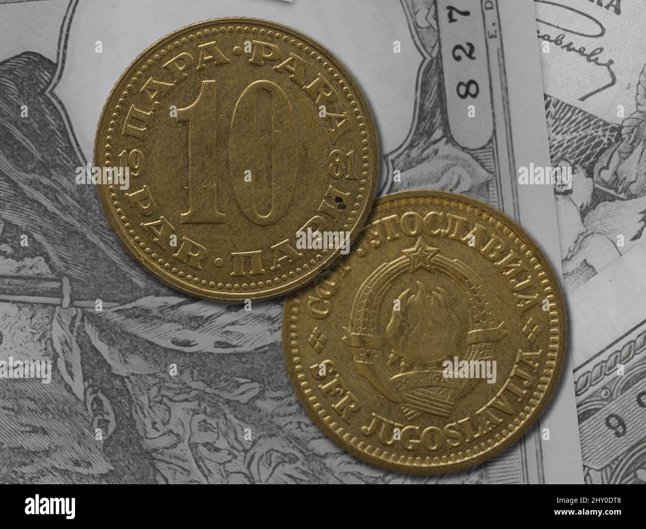 Vintage Yugoslavian 10 dinar coins on a banknote background Stock Photo ...