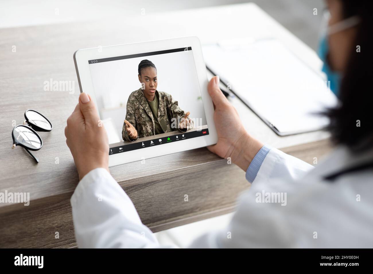 Telemedicine Concept. Military Woman Having Video Call With Therapist ...