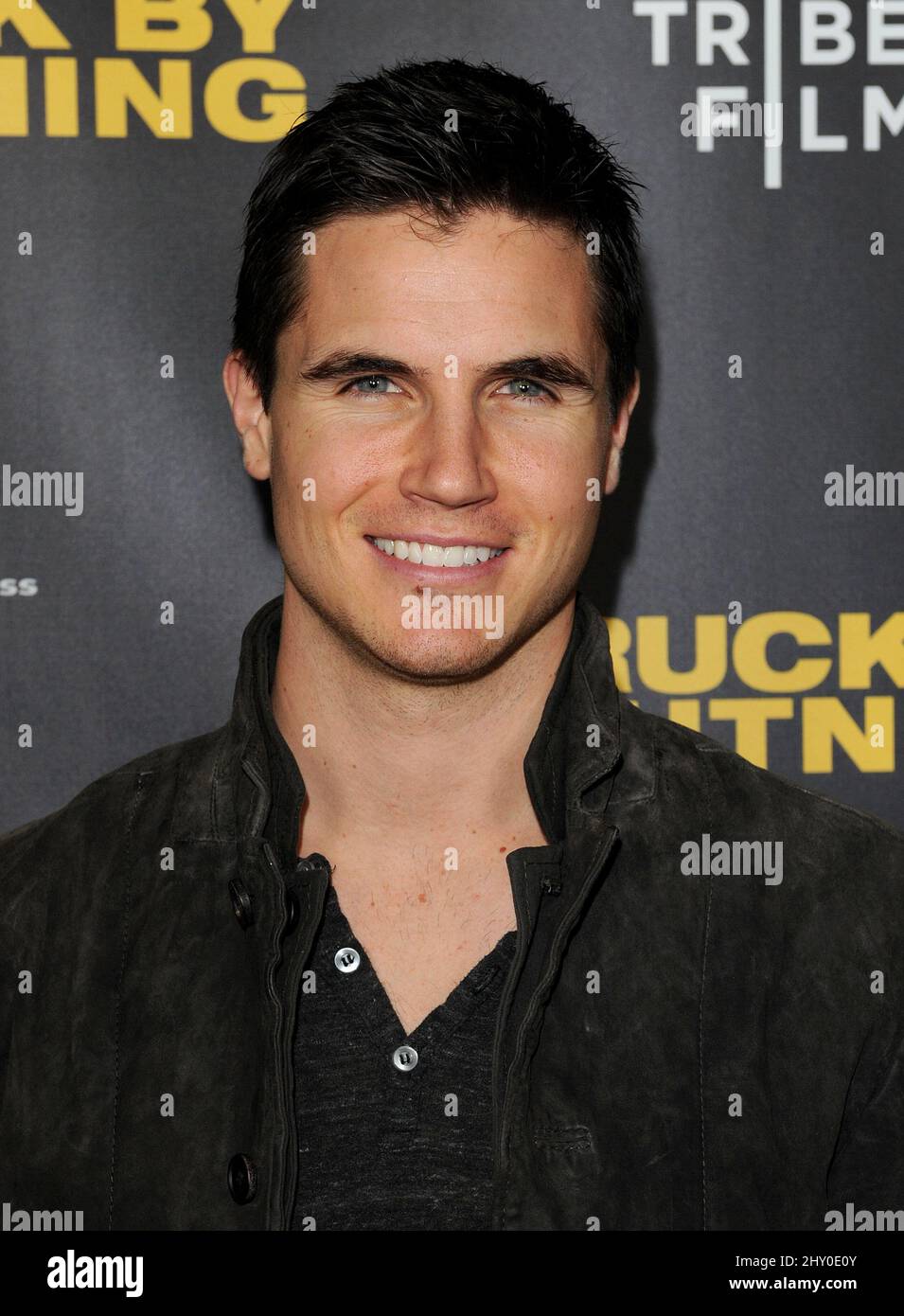 Robbie Amell attending the premiere of "Struck By Lightning" at the ...