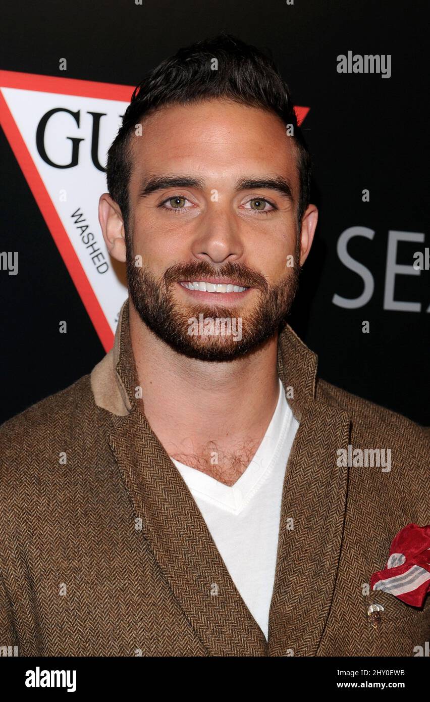 Joshua Sasse attending the "W and Guess Celebrate 30 Years of Fashion ...