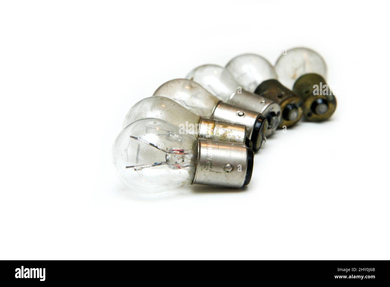 The small group of old shabby small bulbs for the car lights isolated ...