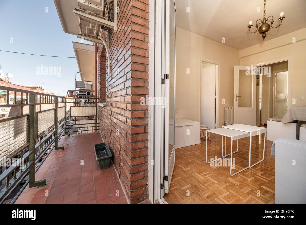 Vacation apartment terrace with clay floors and brown bricks ...