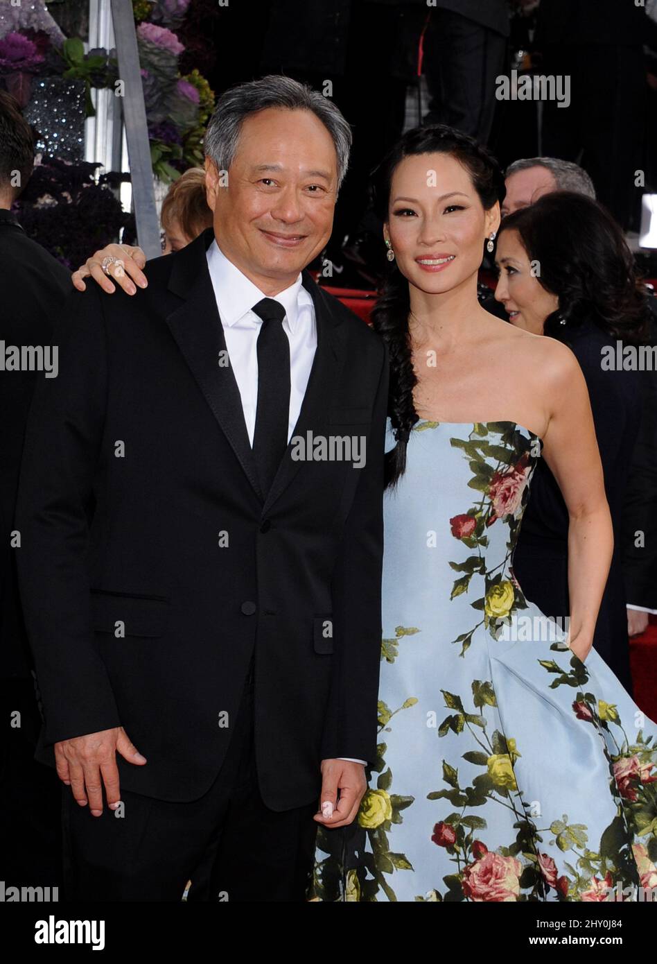 Ang Lee and Lucy Liu arrives at the 70th Annual Golden Globe Awards ...