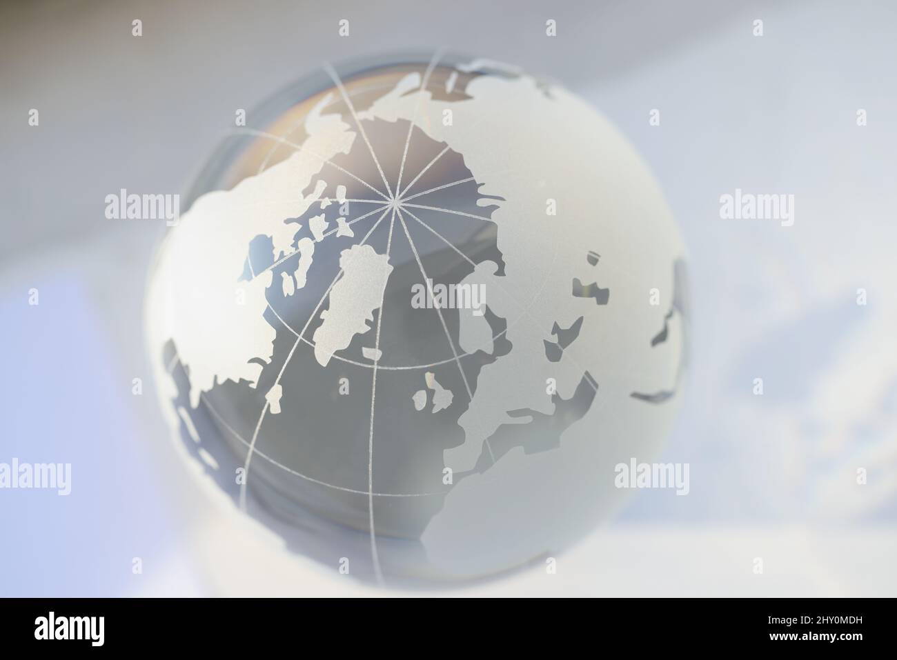 Grey glass world globe, round shaped earth miniature with continents ...