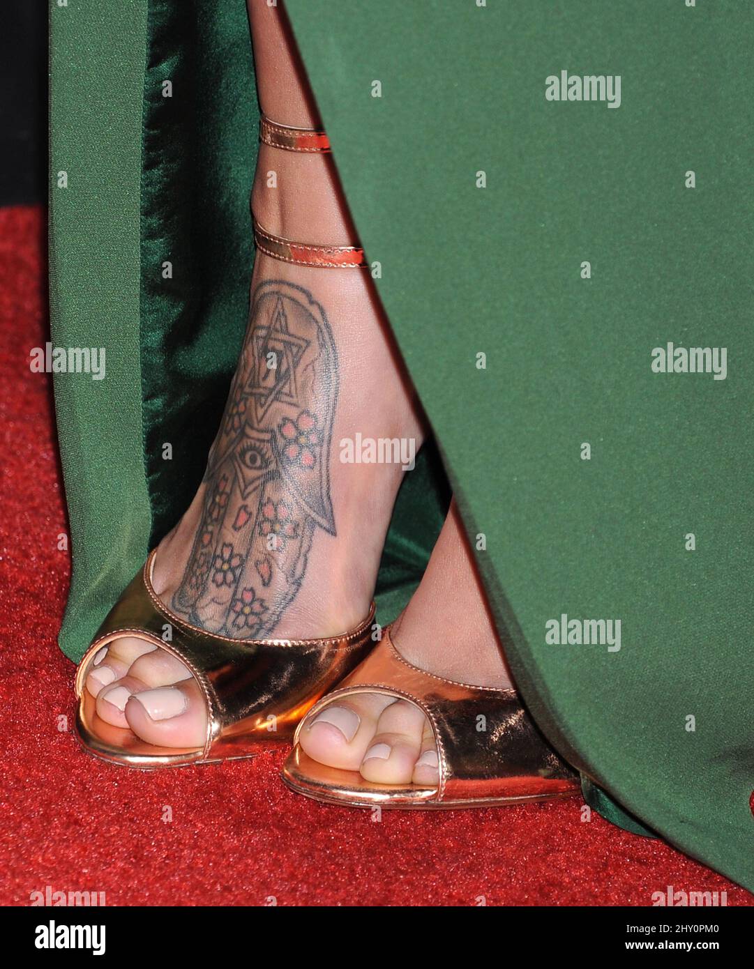 Genesis Rodriguez attending the premiere of "Identity Thief" in ...