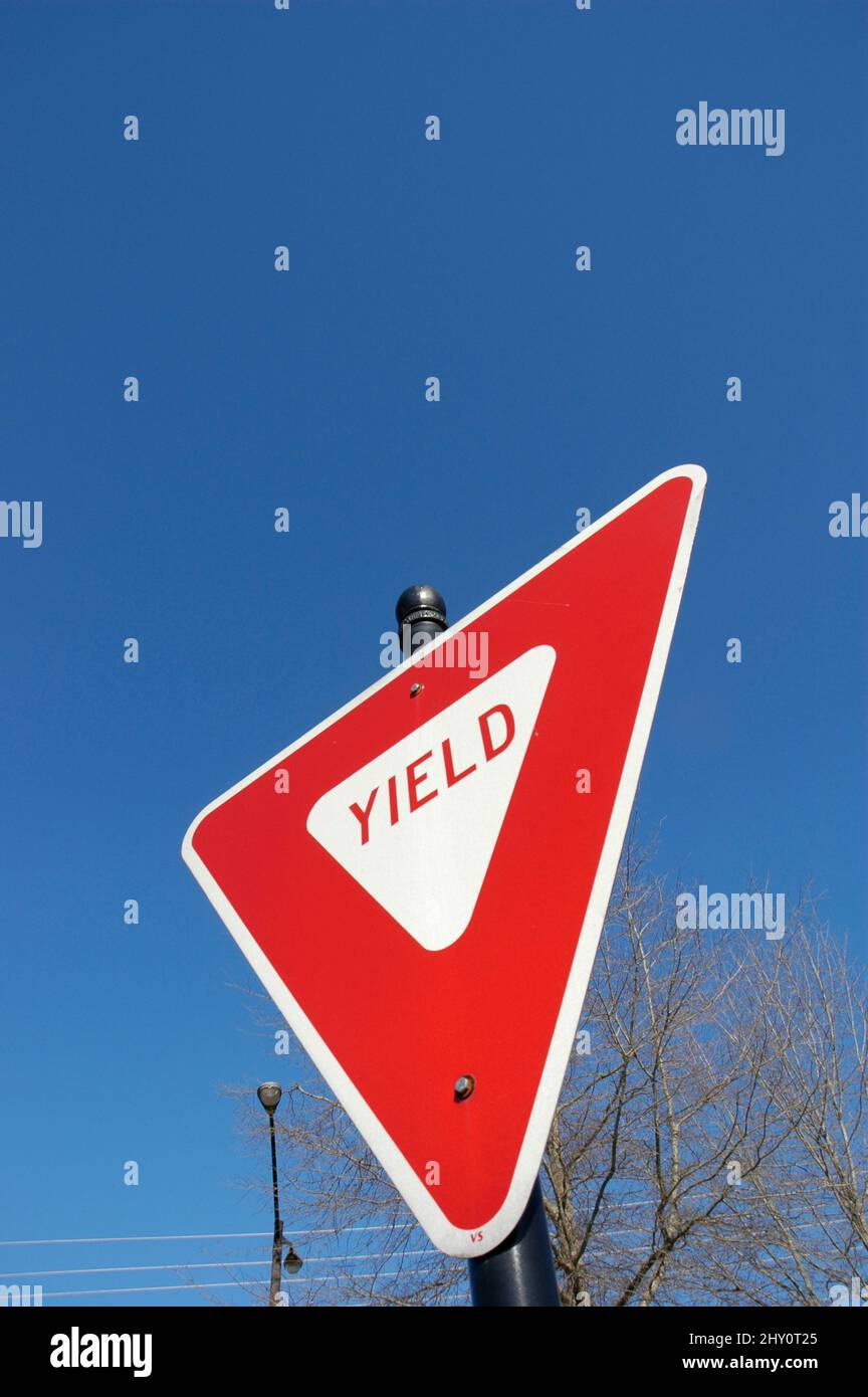 Yield Traffic Sign on roadway Stock Photo - Alamy