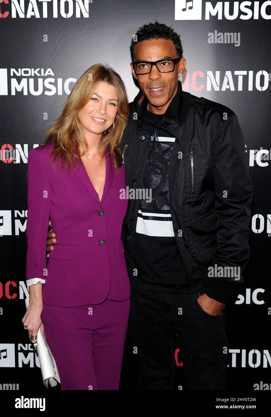 Ellen Pompeo and husband Chris Ivery attending the RocNation Pre Grammy ...