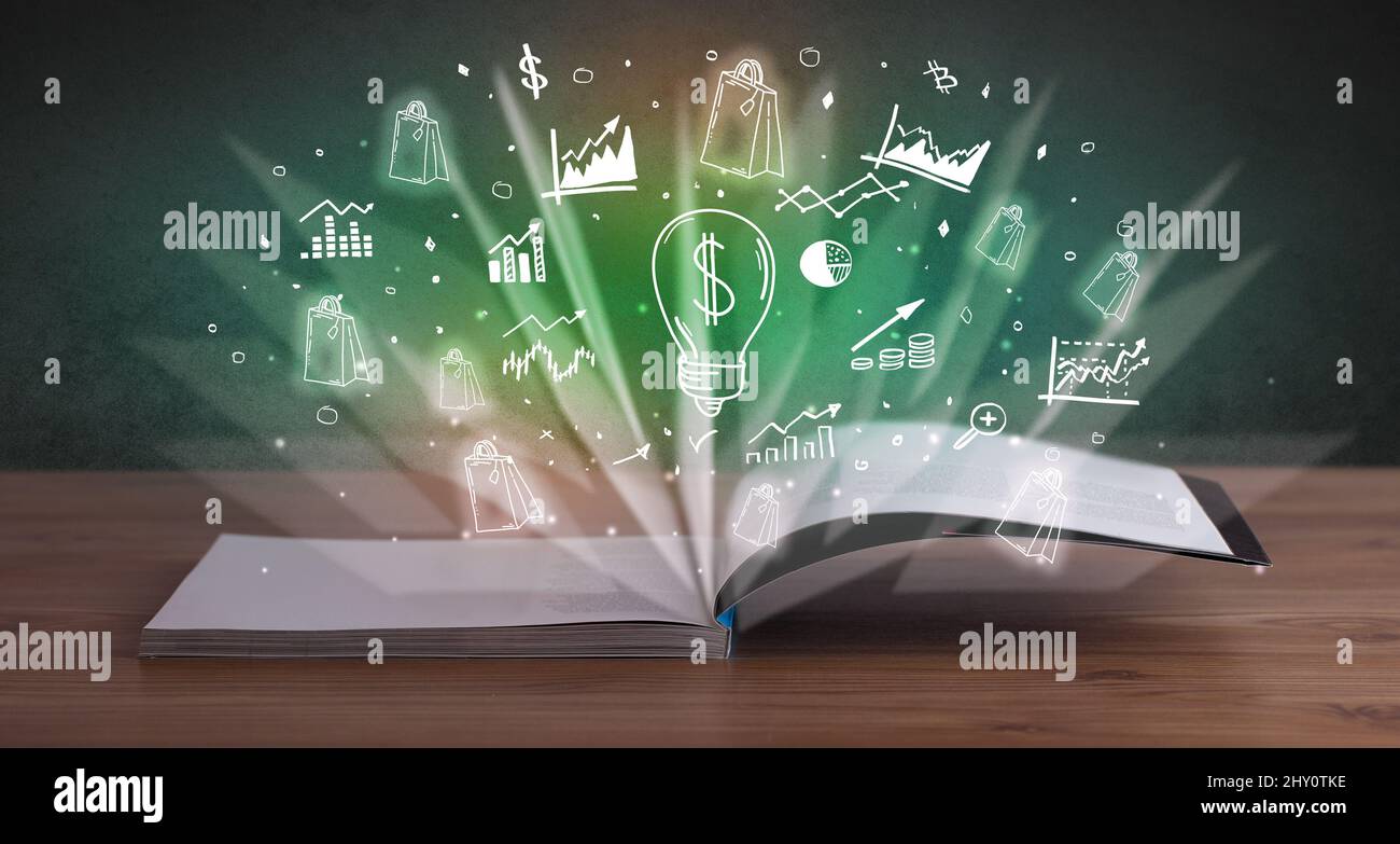 Open book with profit icons above Stock Photo - Alamy
