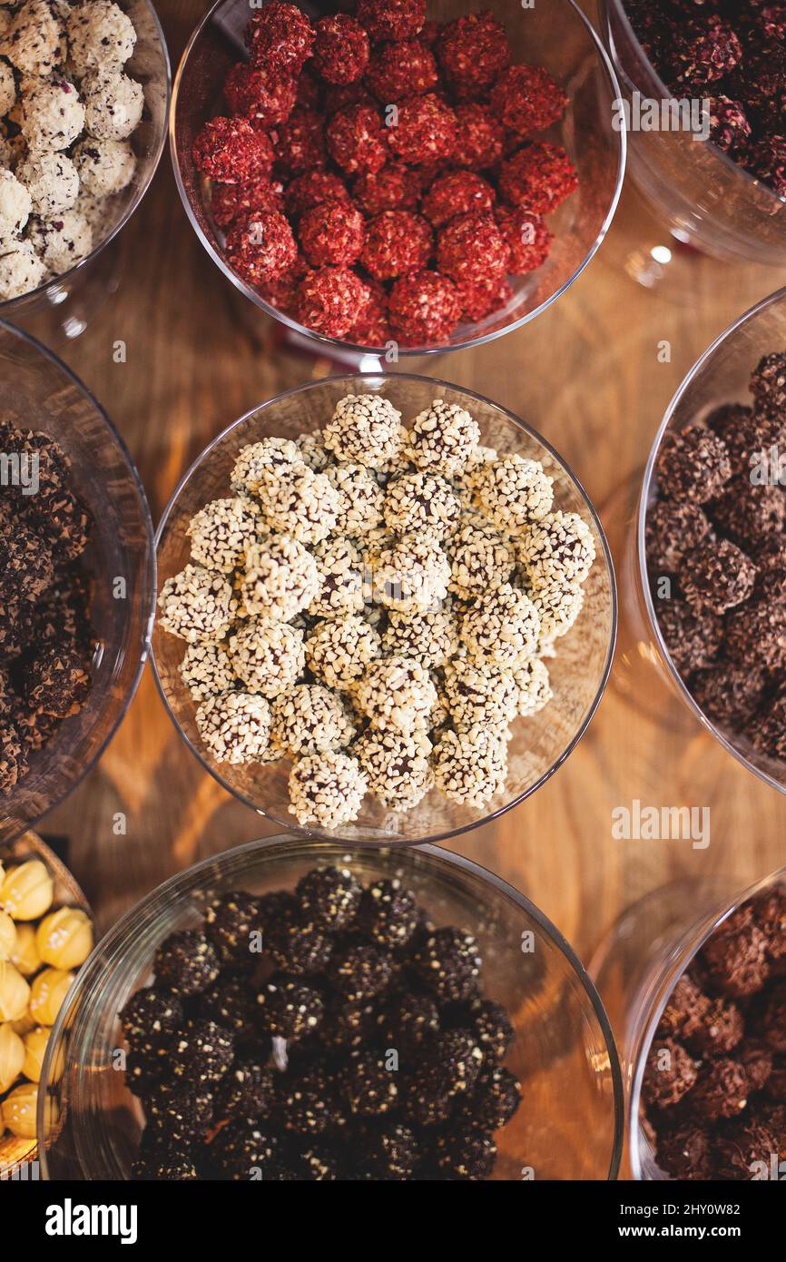 Top view of colorful chocolate truffles Stock Photo - Alamy