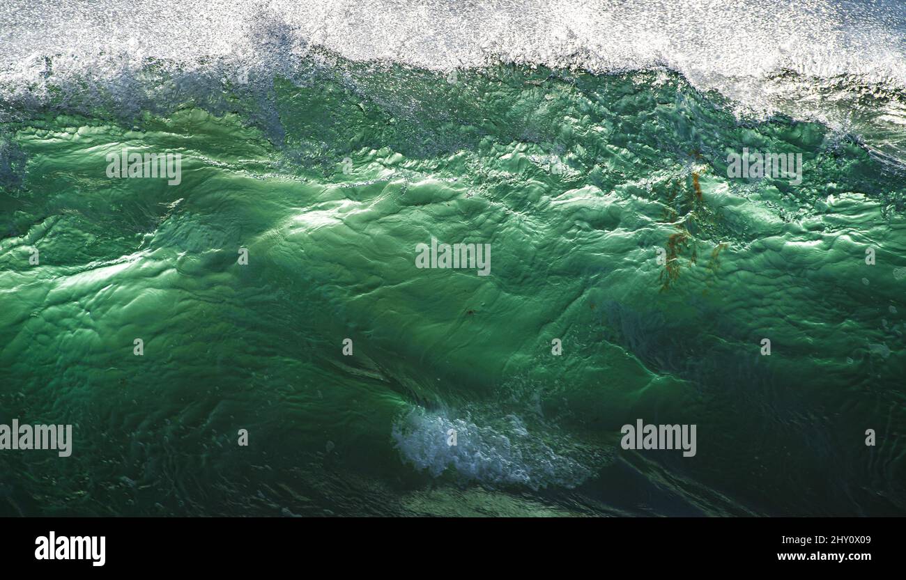 Aerial top view of a green sea with waves Stock Photo - Alamy