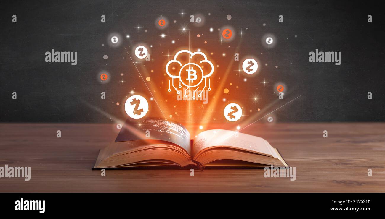 Open book with currency icons above Stock Photo - Alamy