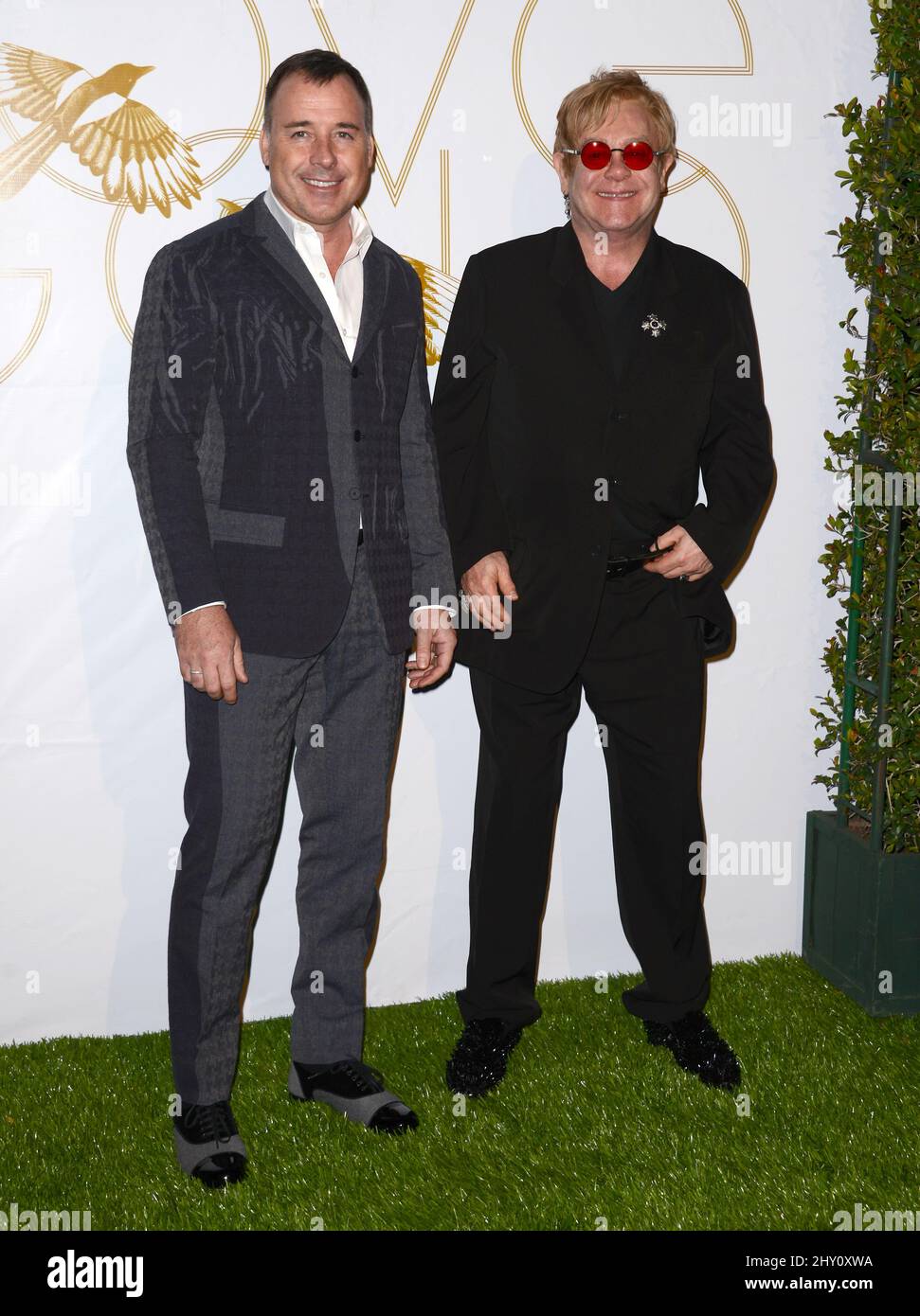 Elton John, David Furnish attending the Elton John AIDS Foundation ...