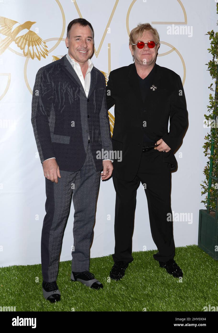 Elton John, David Furnish attending the Elton John AIDS Foundation ...