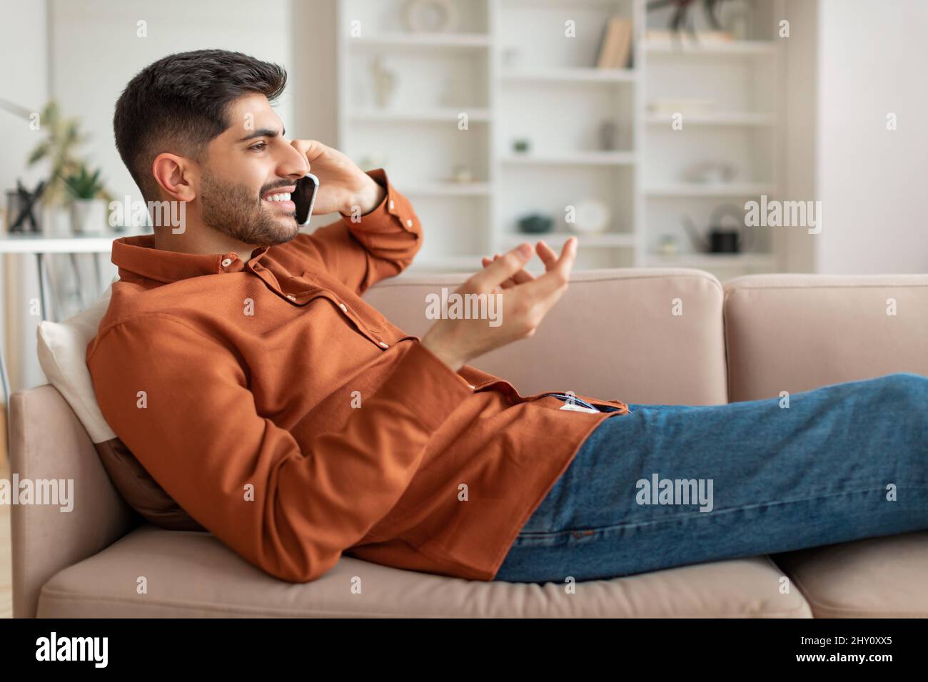 Muslim family talking mobile hi-res stock photography and images - Alamy