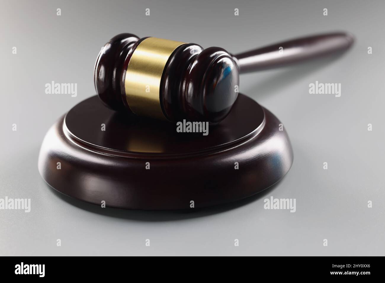 Brown judge wooden hammer on soundboard, attorney instrument for legal ...