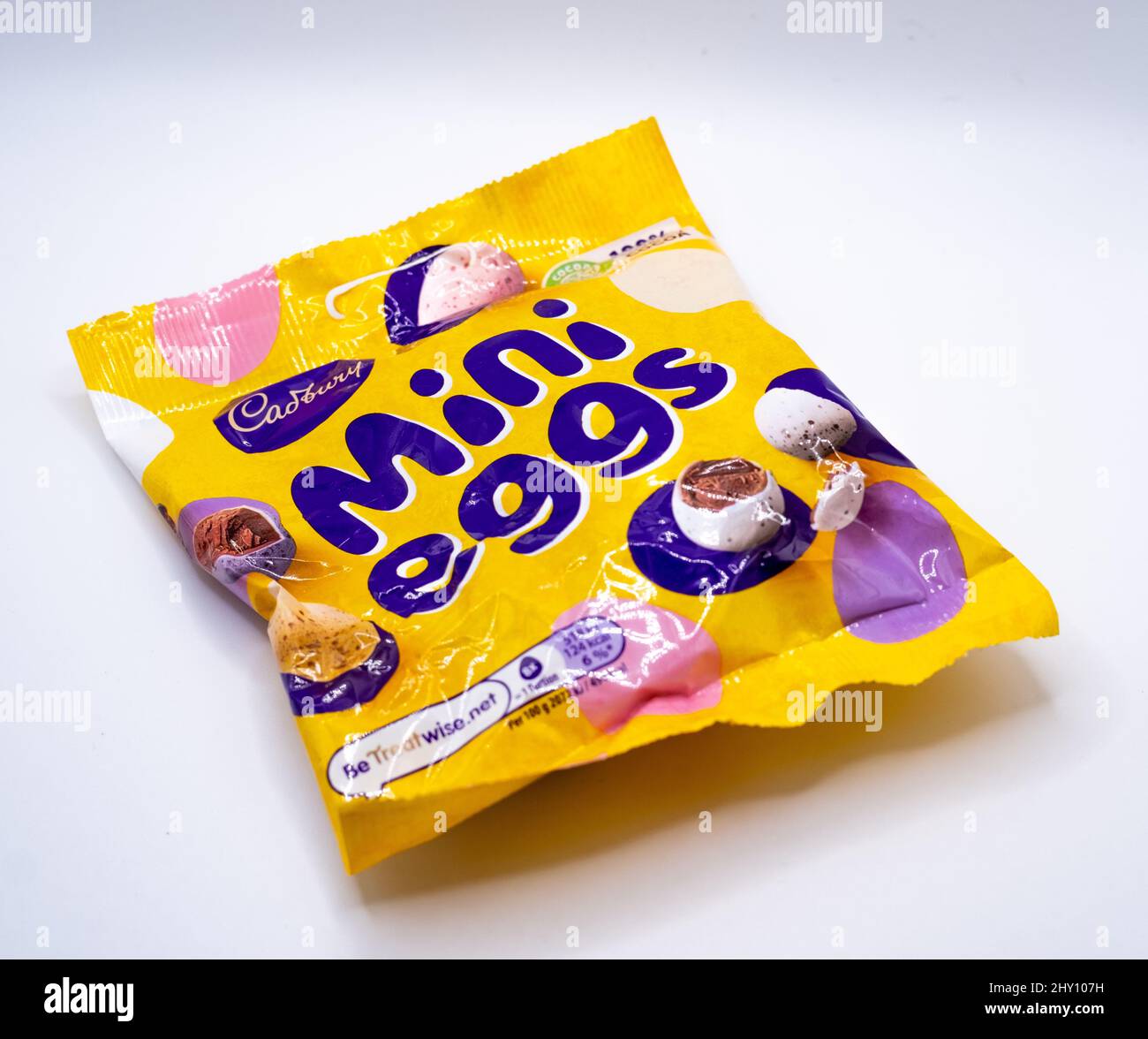 Packet of Cadbury Mini Eggs isolated on a plain white background Stock ...