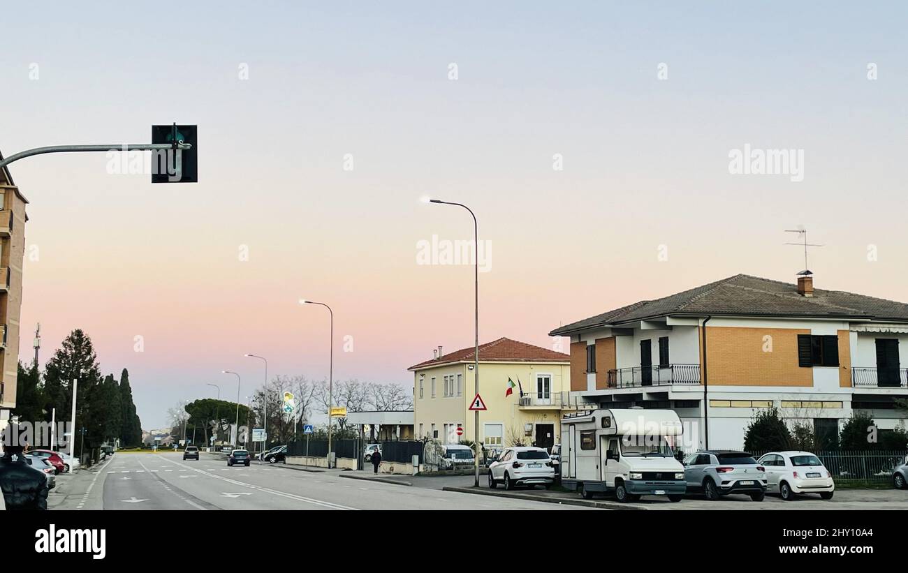 Vertical shot of a street with buildings and parked cars Stock Photo ...