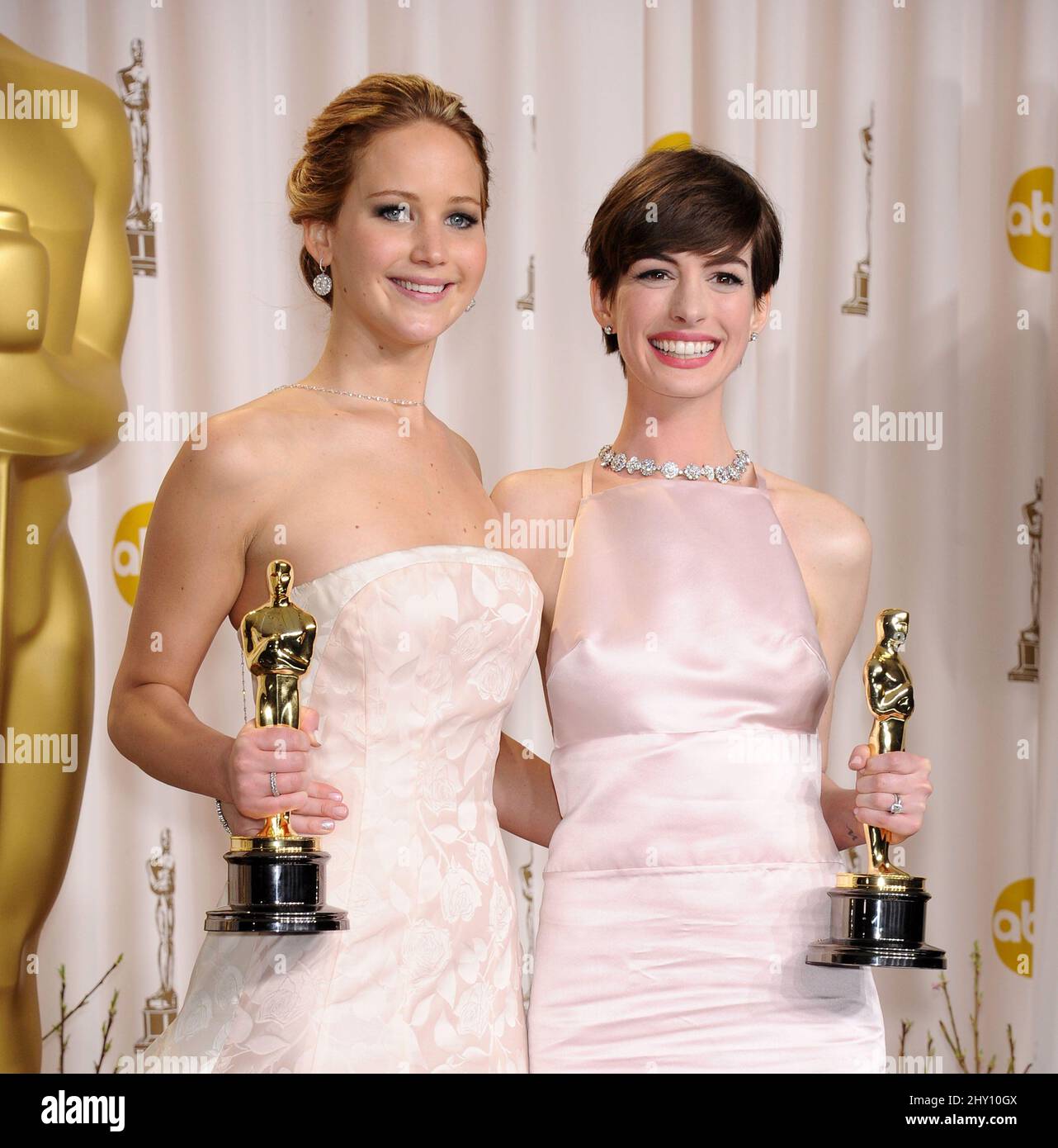 Jennifer Lawrence & Anne Hathaway attending the 85th Academy Awards ...