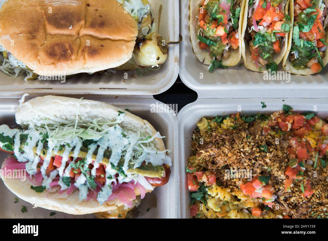 Overhead shot of Mexican street food in takeaway boxes Stock Photo - Alamy