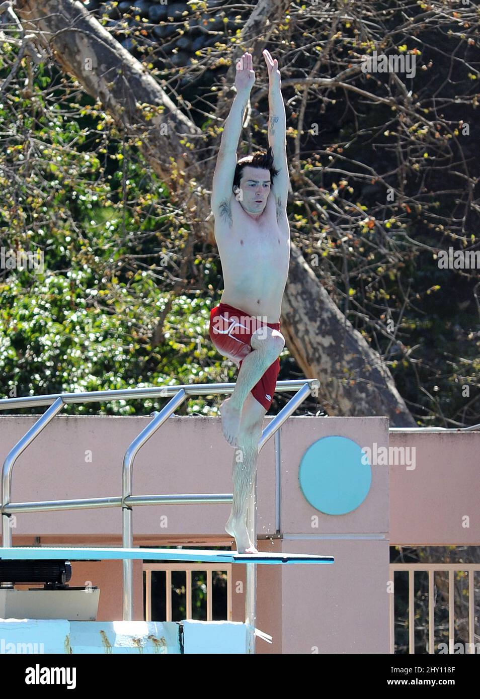 Drake Bell on the set of "Celebrity Splash" practicing his dives in ...
